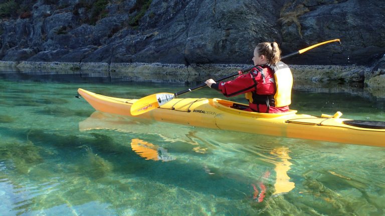 Kayaking in clear water | Explore Lysefjorden